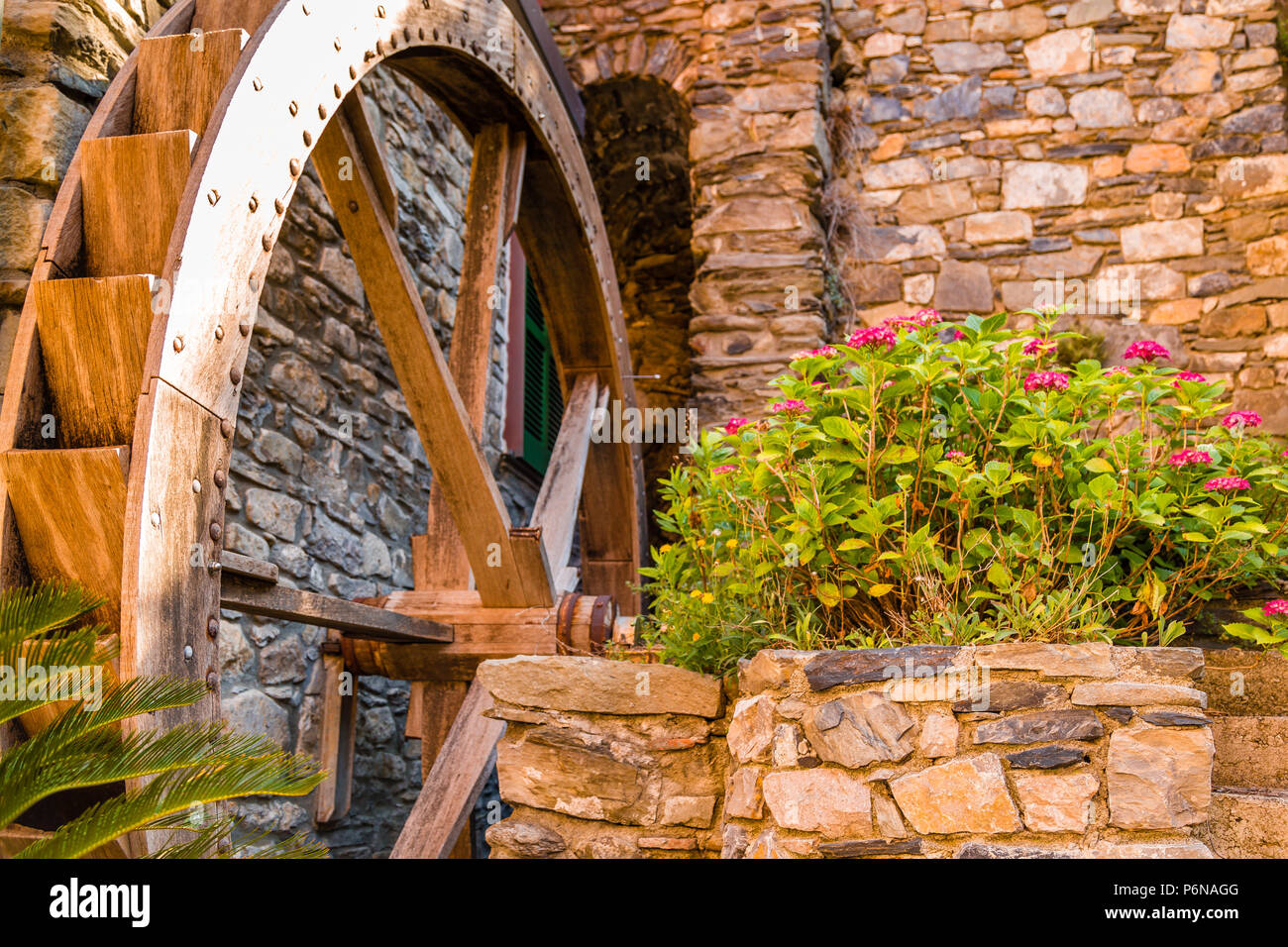 Wooden Wheel of Old Mill Stock Photo - Alamy