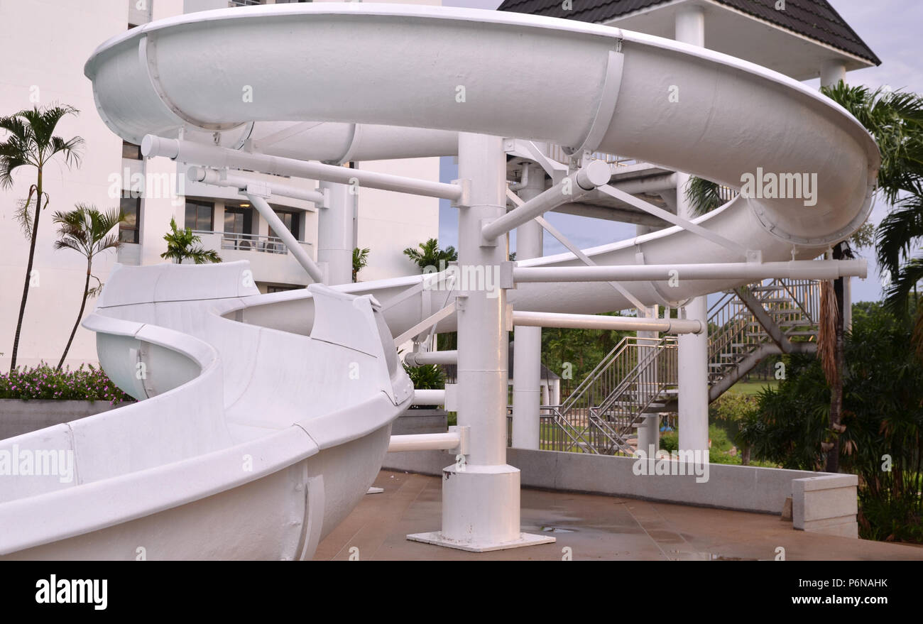 slider in front of swimming pool Stock Photo - Alamy