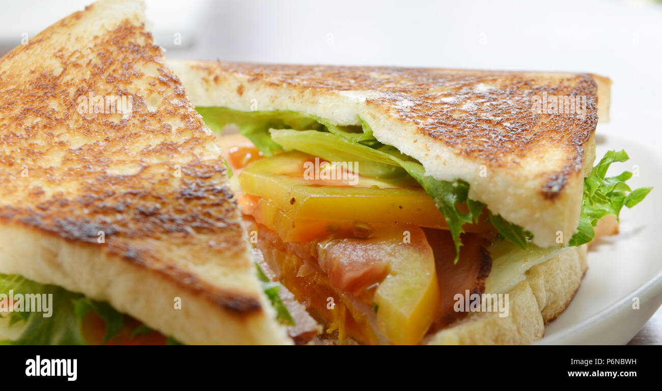 Club sandwich with coffee on wood background Stock Photo - Alamy