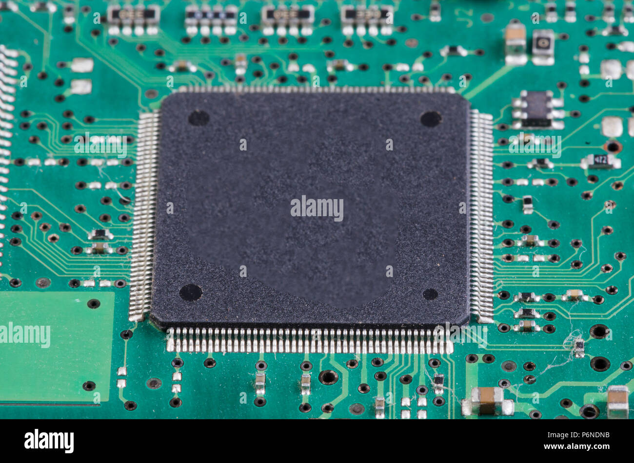 Closeup of electronic circuit board with processor Stock Photo - Alamy