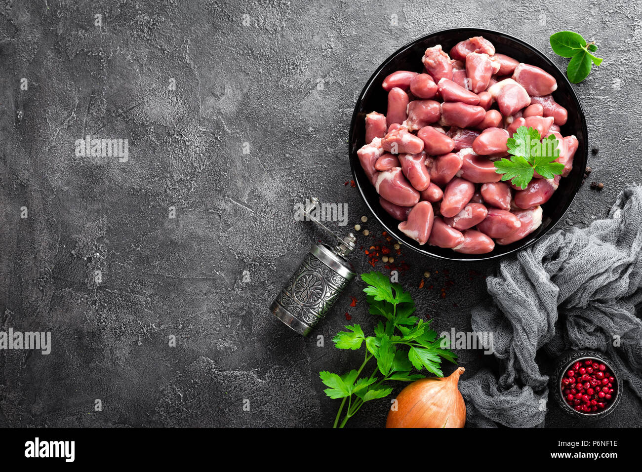 Raw chicken hearts. Fresh chicken hearts Stock Photo - Alamy