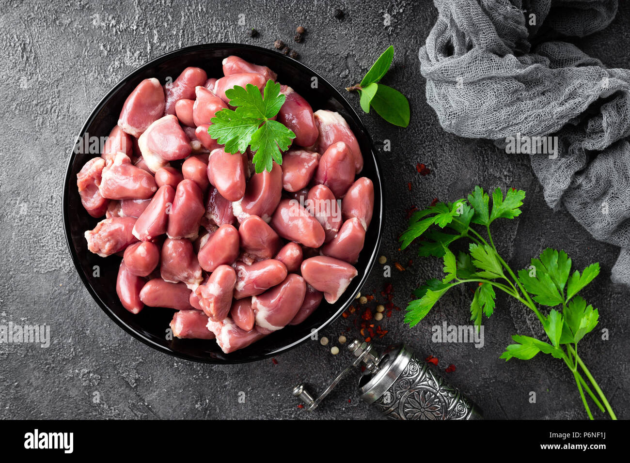 Raw chicken hearts. Fresh chicken hearts Stock Photo - Alamy