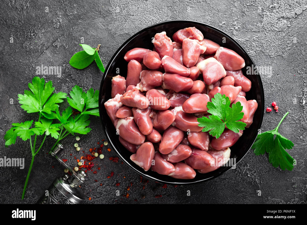 Raw chicken hearts. Fresh chicken hearts Stock Photo - Alamy