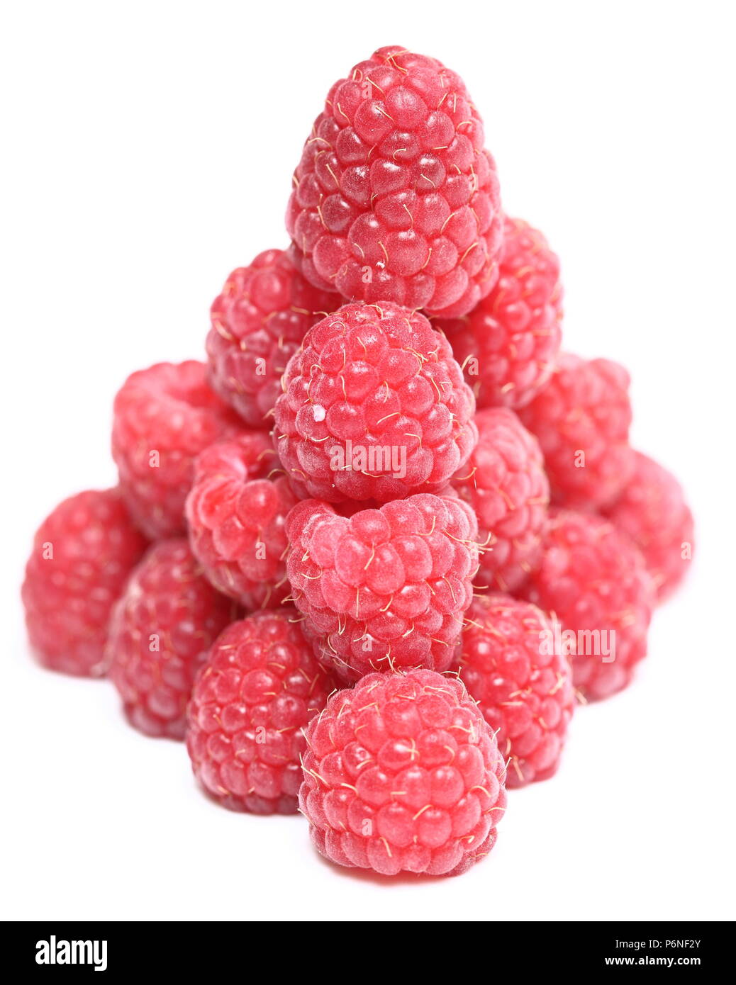 The pyramid of ripe raspberry over white background Stock Photo - Alamy