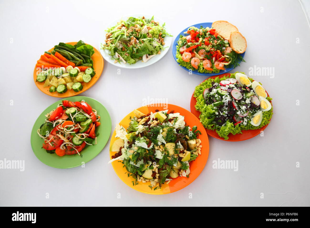 set with different salads on white background Stock Photo - Alamy