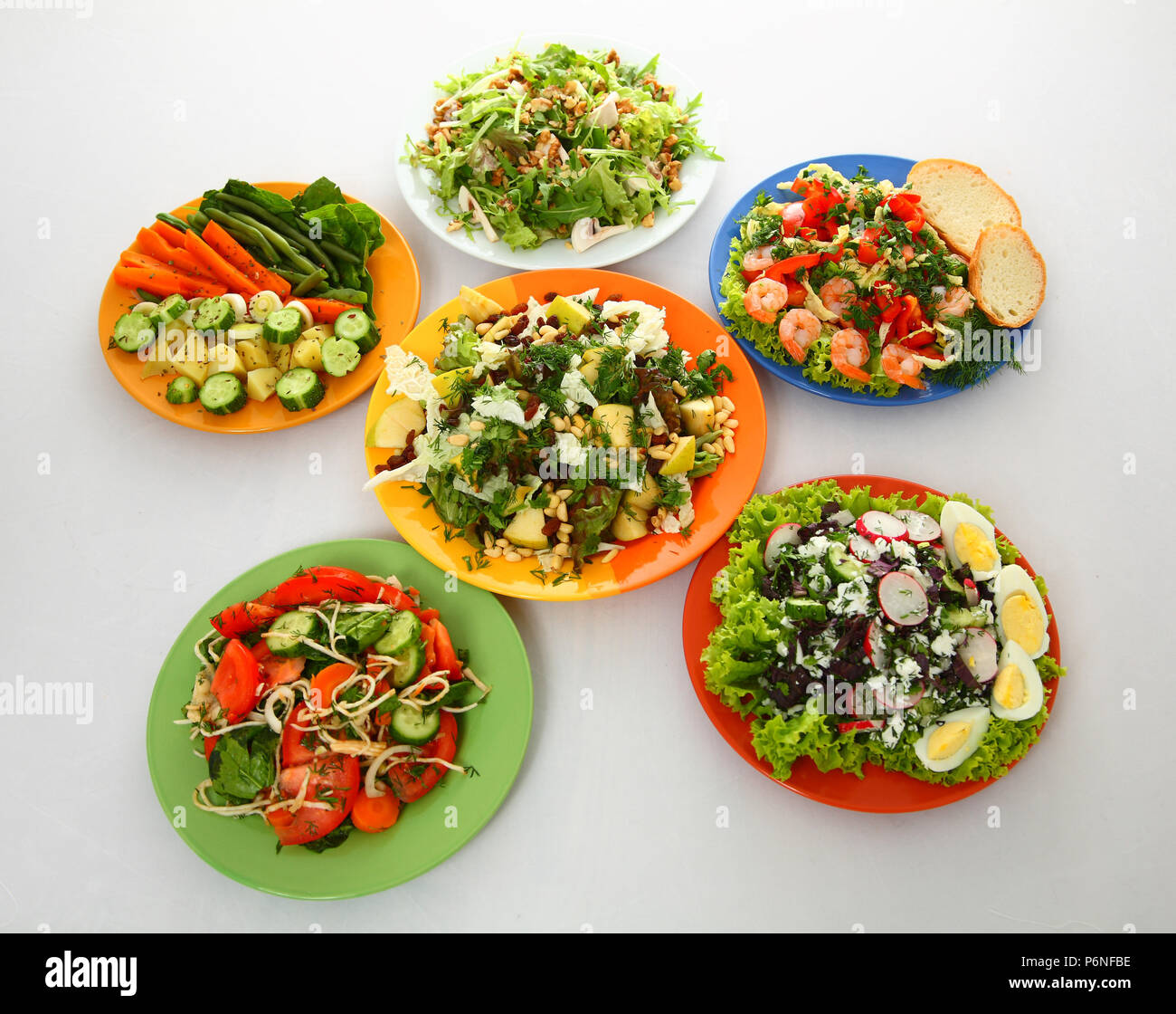 set with different salads on white background Stock Photo - Alamy