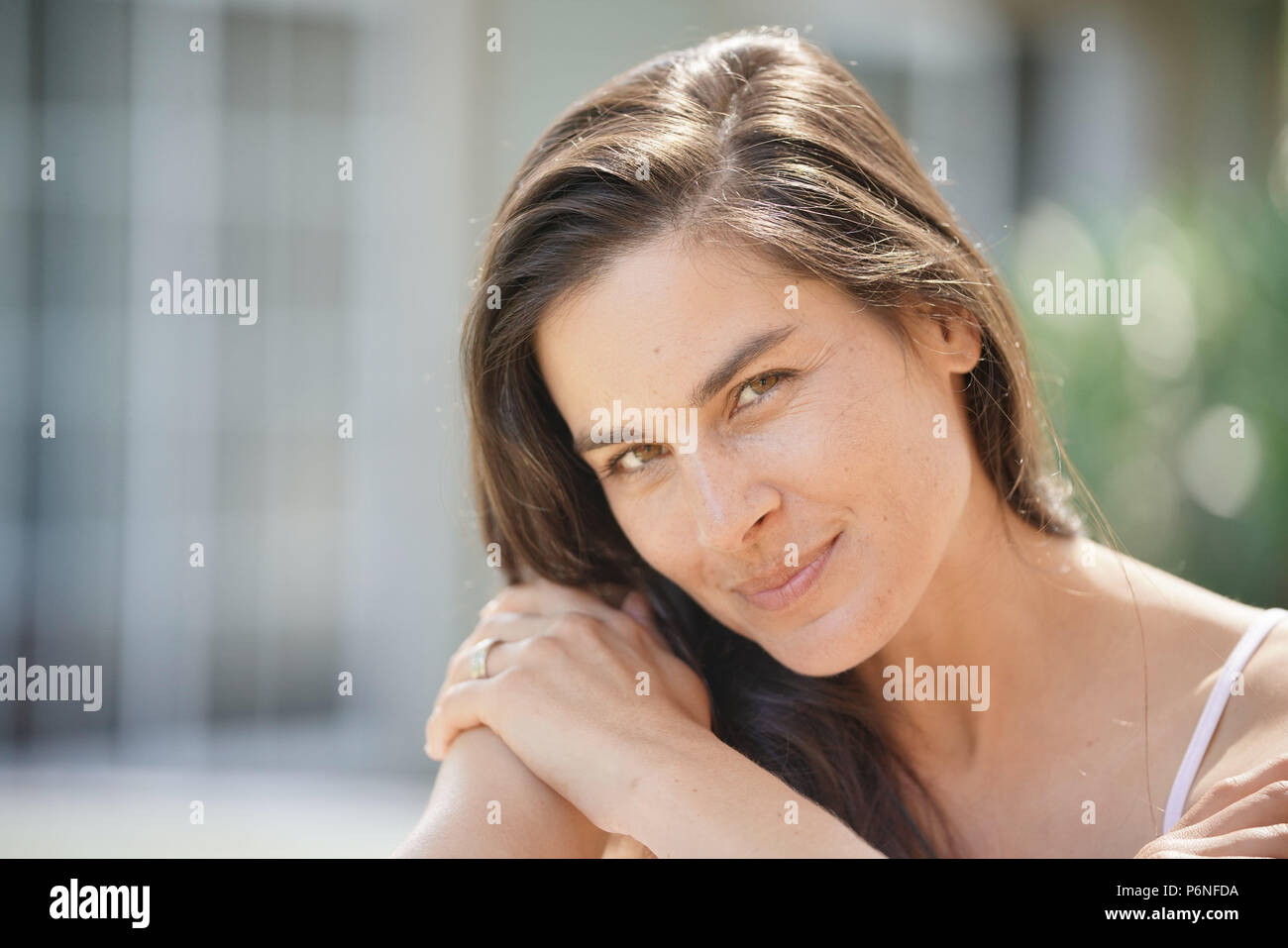 Portrait of attractive 40-year-old brunette woman Stock Photo - Alamy