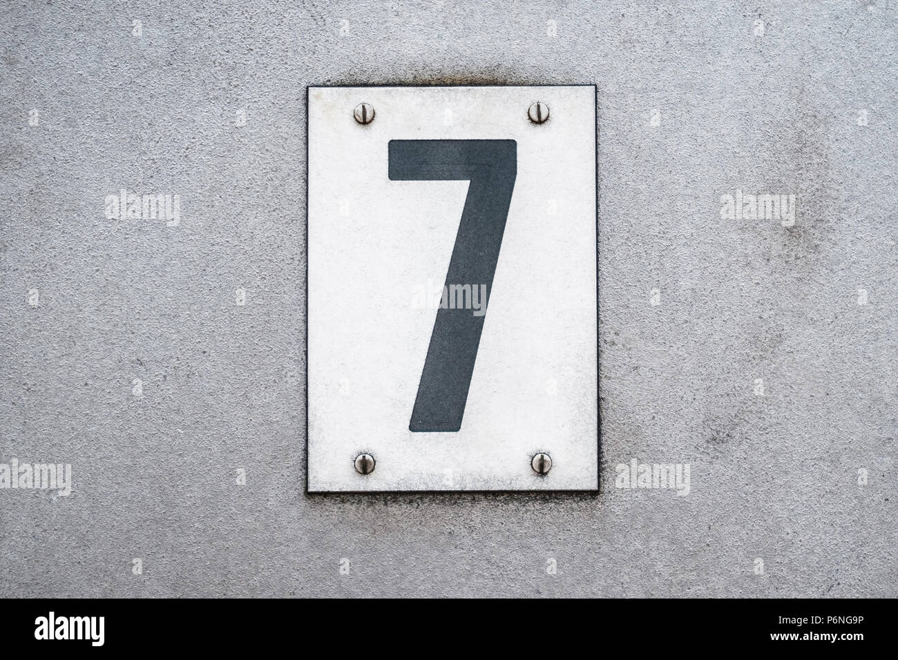 Number 7 / seven on metal background / house number Stock Photo - Alamy