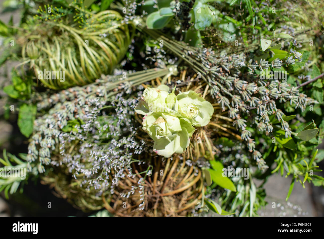 Creative bouquet of fresh flowers with spices and herbs Stock Photo - Alamy