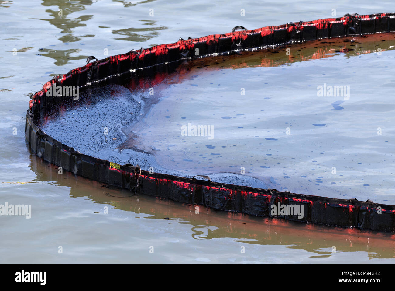 floating barrier to dam oil pollution Stock Photo - Alamy