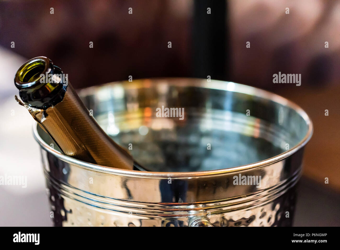 Champagne bottle in bucket Stock Photo - Alamy