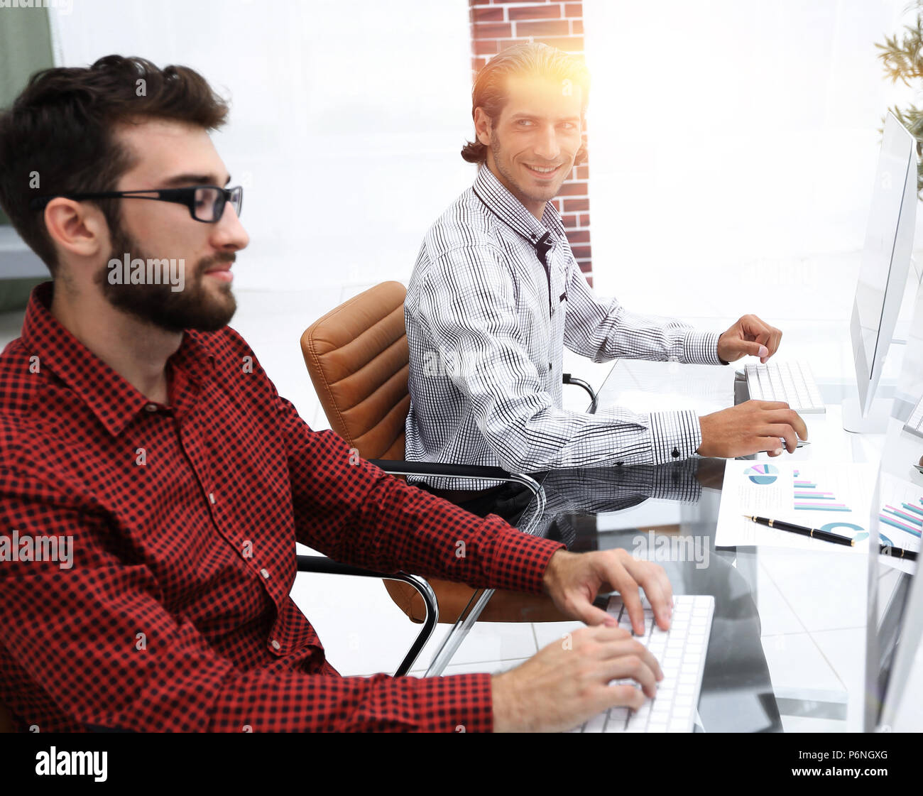 company's employees work in the office Stock Photo - Alamy