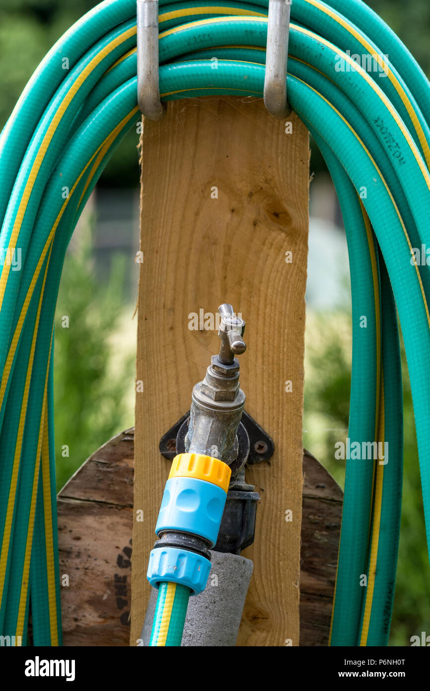 Garden hosepipe reel hi-res stock photography and images - Alamy