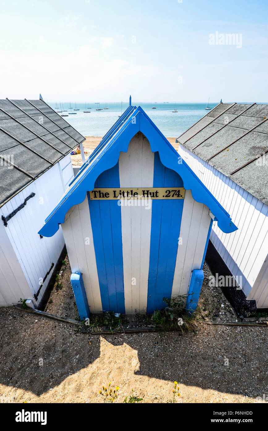 The Little Hut. Small narrow beach hut. Multi coloured colourful beach ...