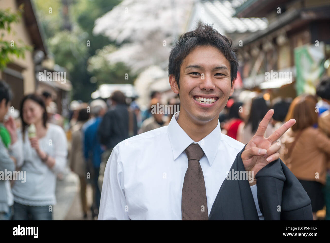 Japanese tourists explore Arashiyama in the outskirts of Kyoto, Japan ...