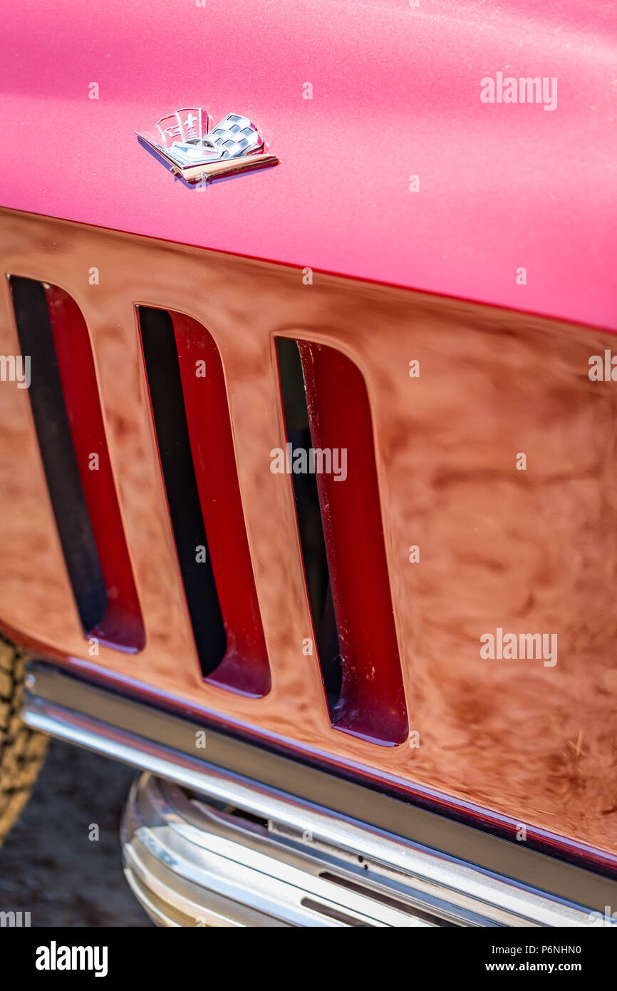 Shallow depth of field closeup of the front fender louvers and name ...