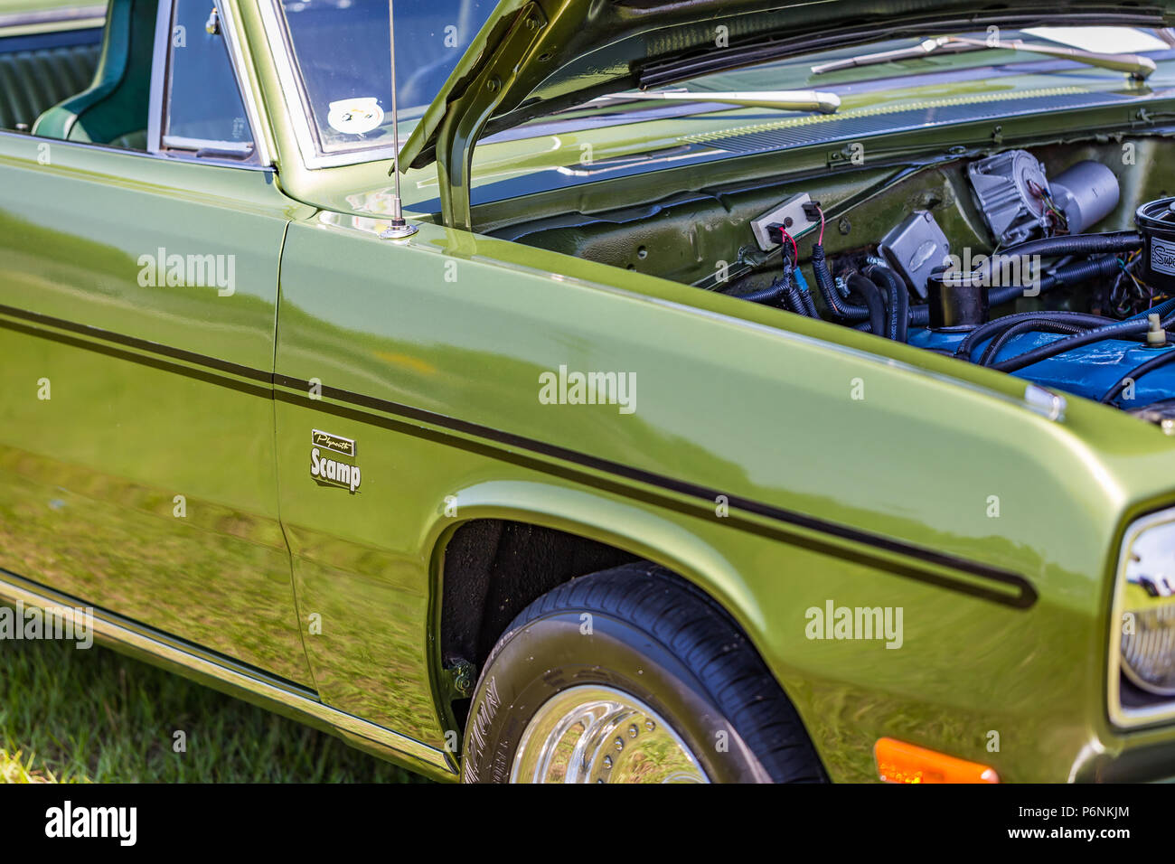 Shallow depth of field closeup of the fender badge on a 1972 Plymouth ...