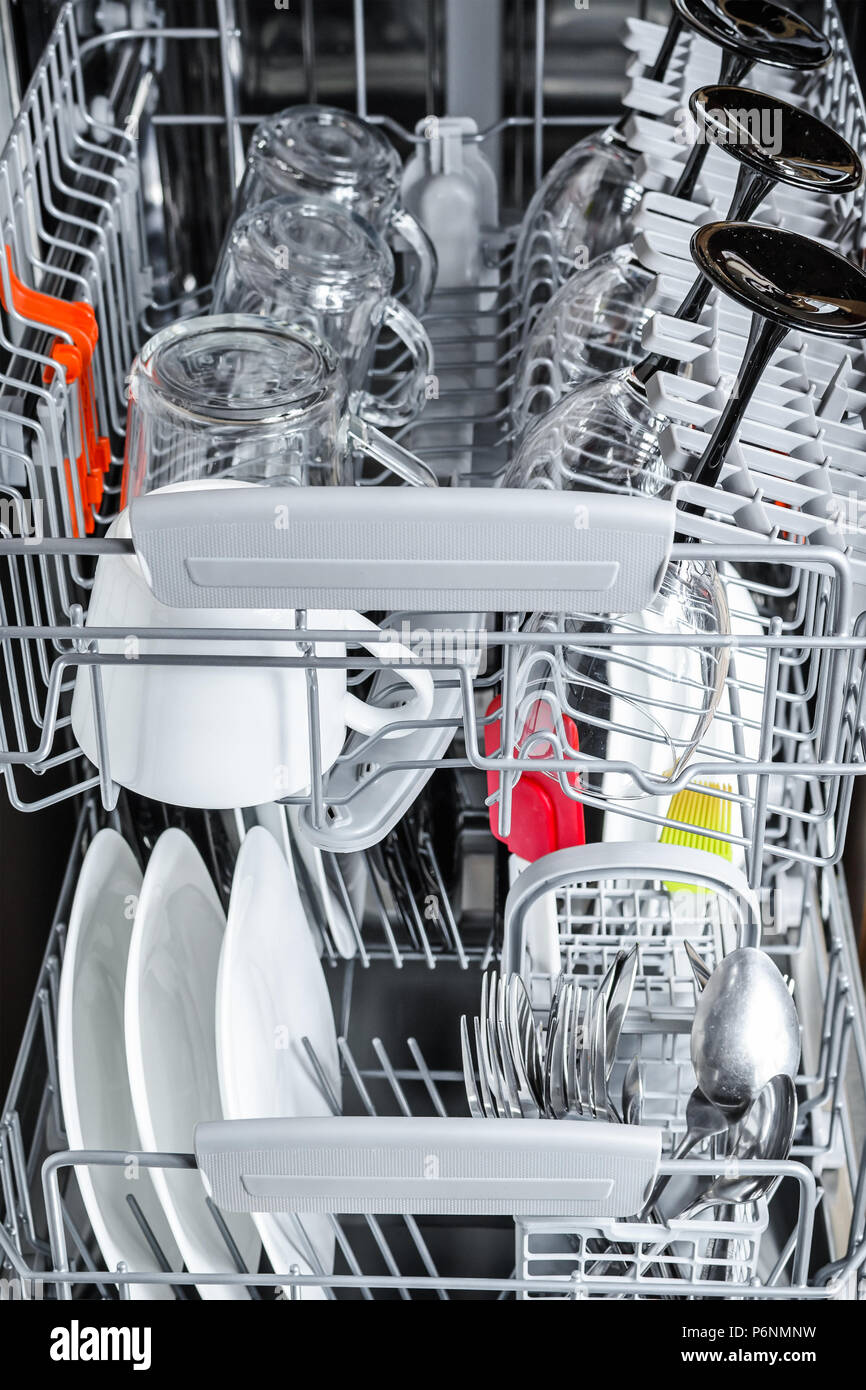 clean dishes inside the dishwasher after washing Stock Photo - Alamy