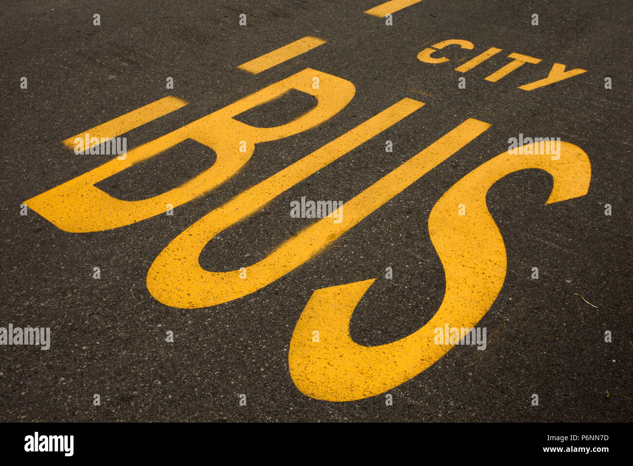 yellow city bus fast lane Stock Photo - Alamy