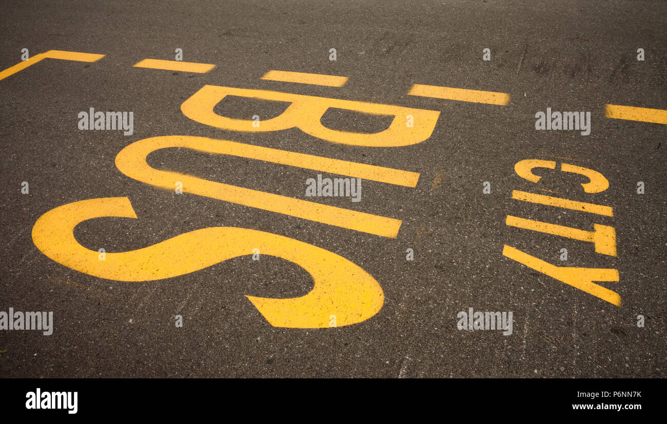 yellow city bus fast lane Stock Photo - Alamy