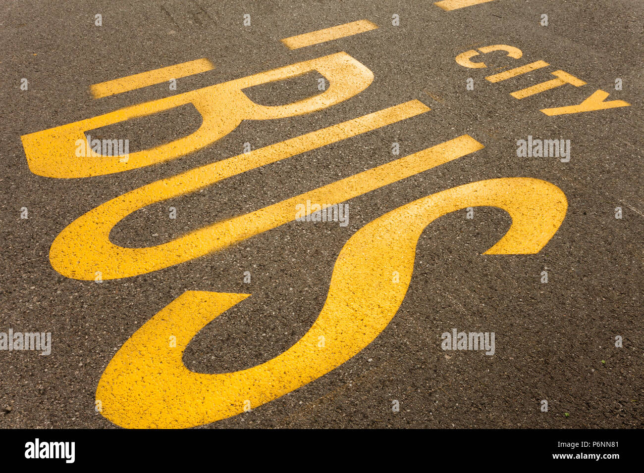 yellow city bus fast lane Stock Photo - Alamy