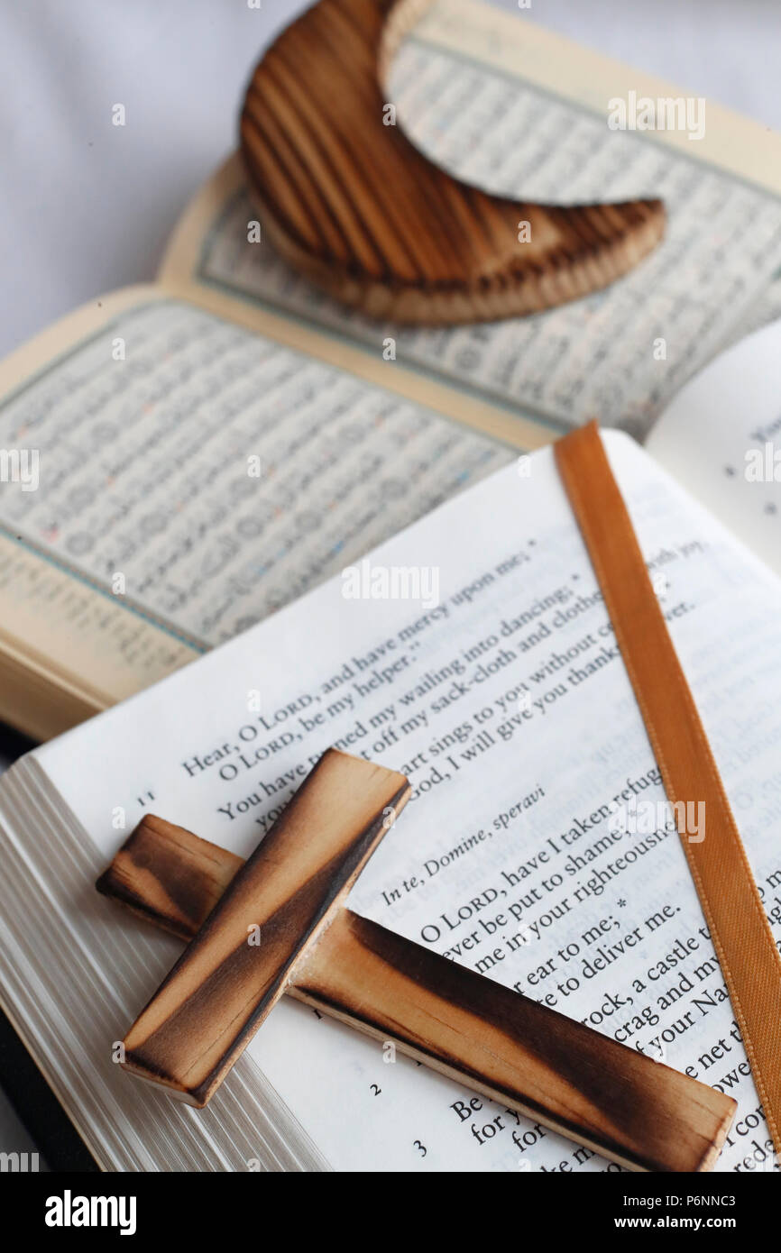 Christianity, Islam 2 monotheistic religions. Bible, Quran, cross and ...