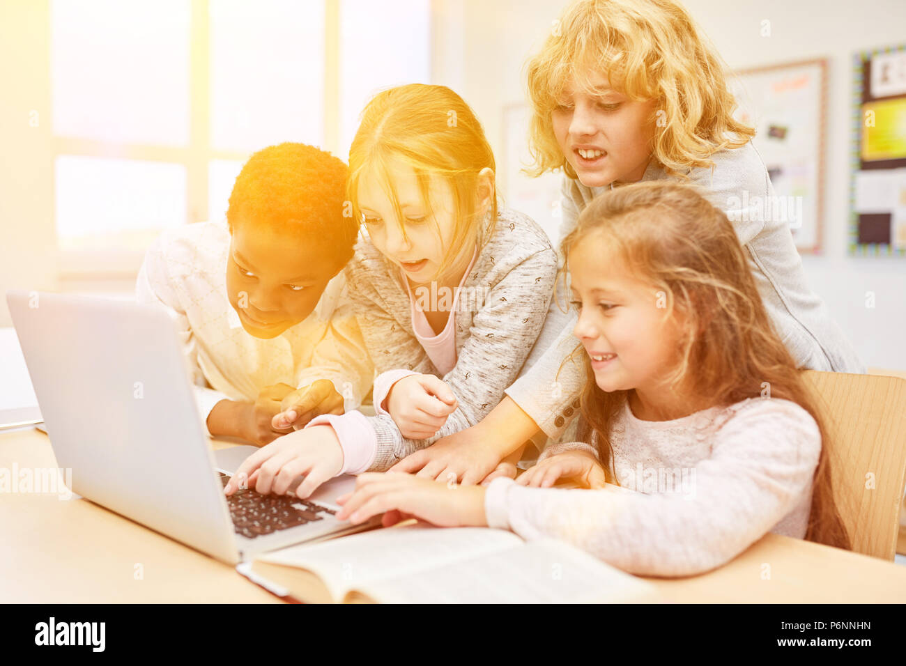 Boy sitting in front computer hi-res stock photography and images - Alamy