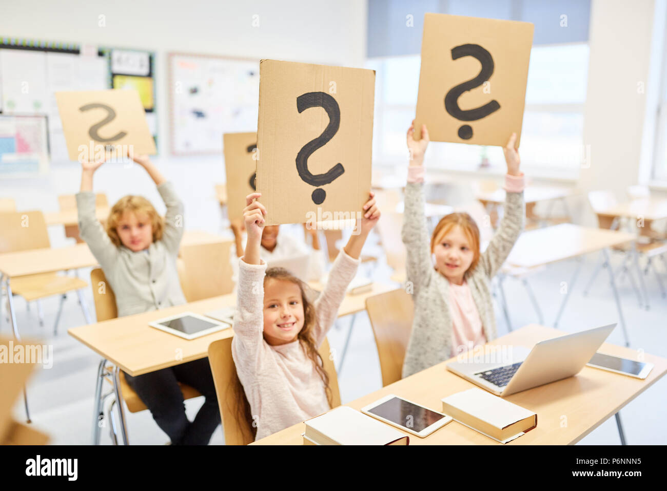 Group of kids in elementary school keeps question mark up where and why ...