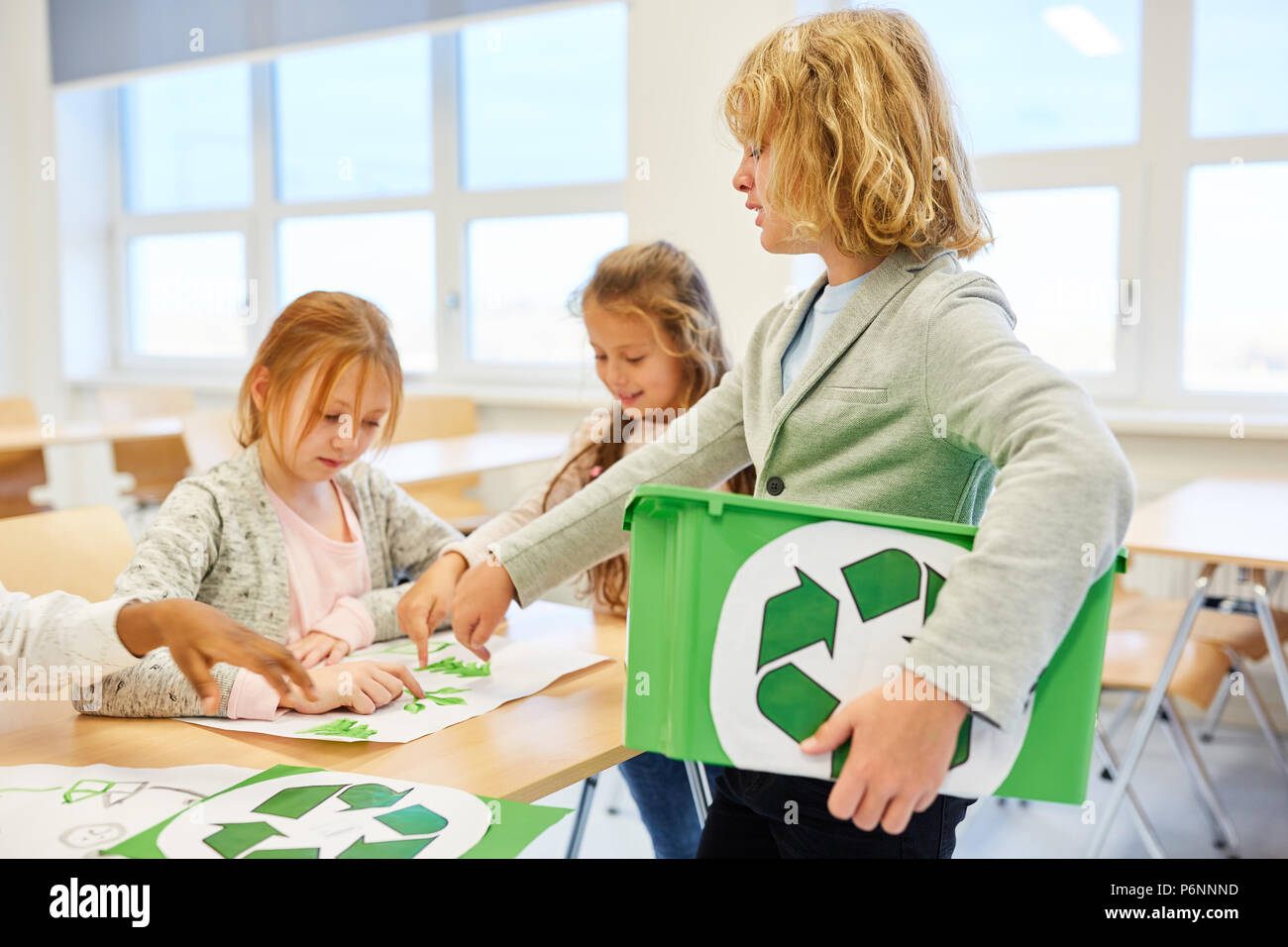 Elementary school students in physical education plan an action to ...