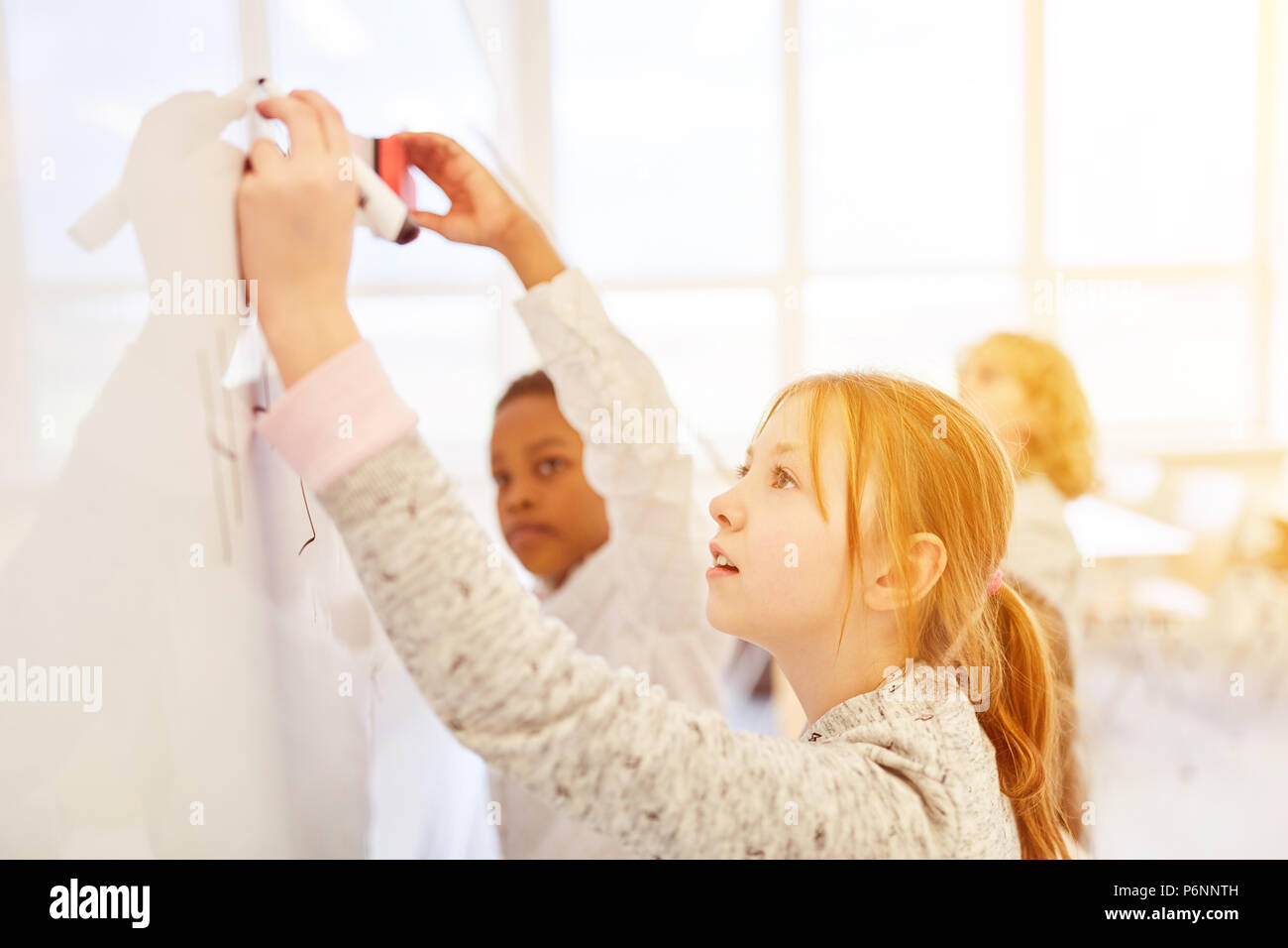 School task together hi-res stock photography and images - Alamy