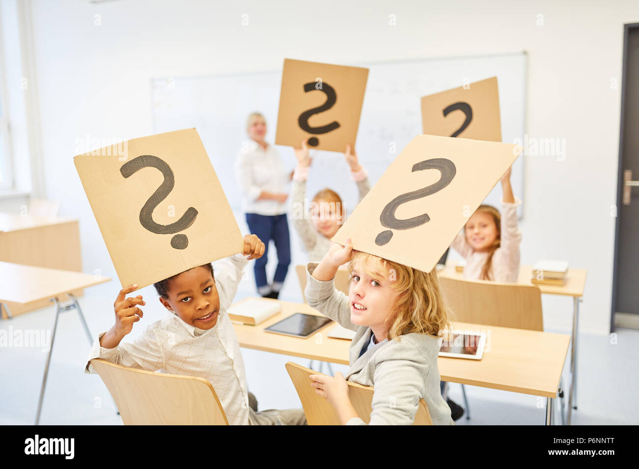 Children in elementary school keep question mark for problem and doubt ...