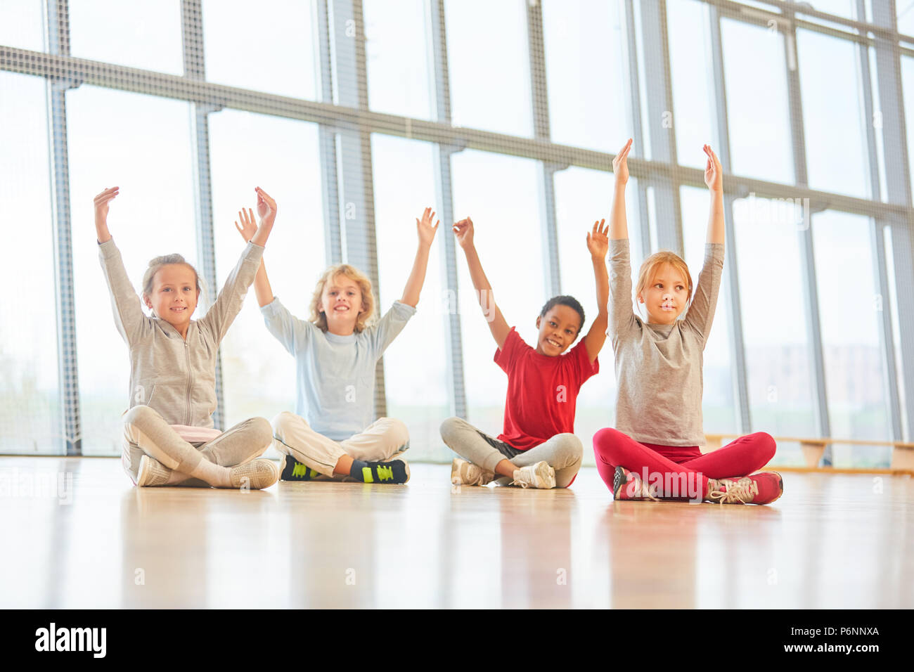 Kids stretching hi-res stock photography and images - Alamy