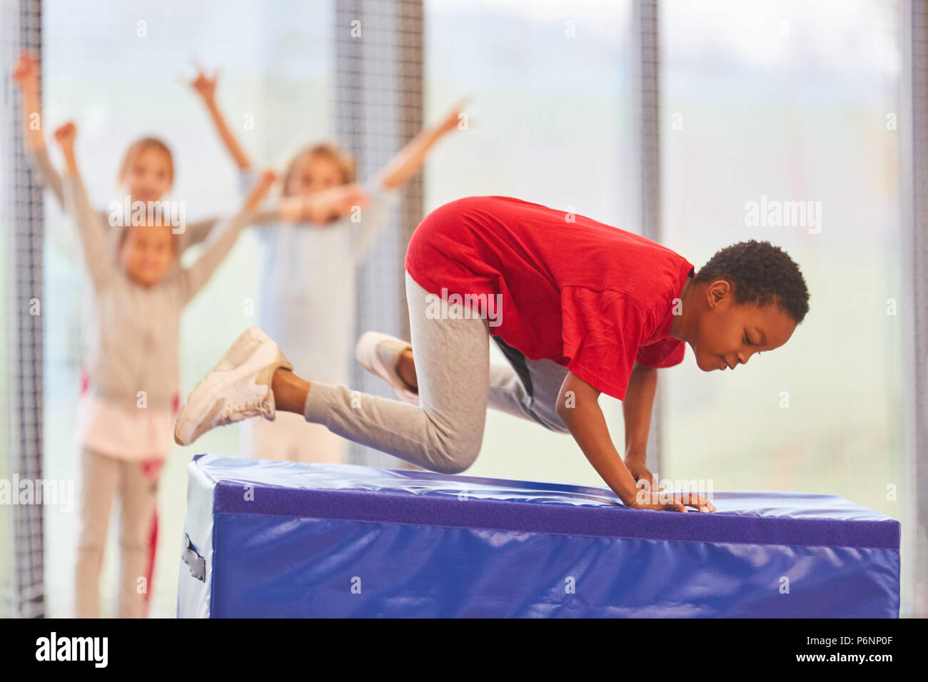 Children train their fitness in a competition and have fun Stock Photo ...