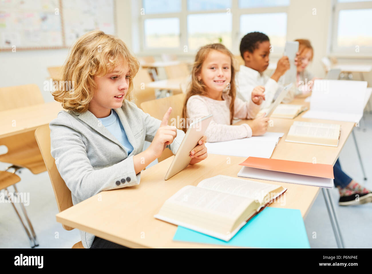 Children computer tablet class hi-res stock photography and images - Alamy