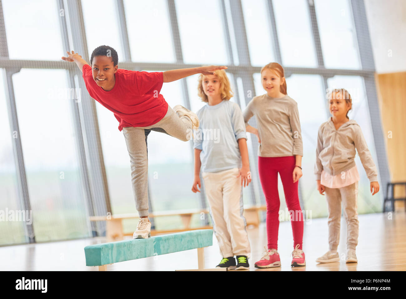 Gymnastics balance beam boy hi-res stock photography and images - Alamy