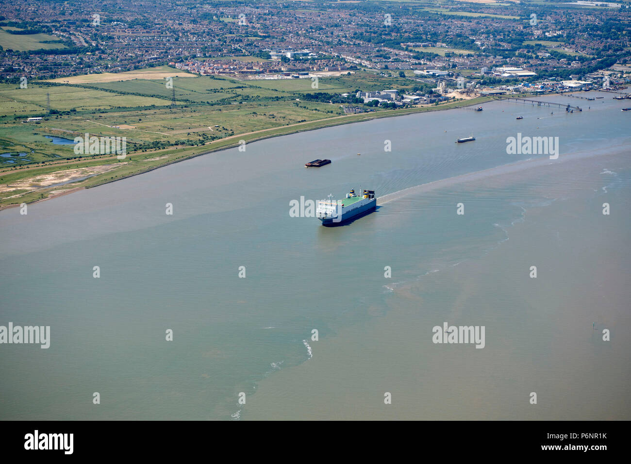 Ship sailing past Gravesend on the river Thames, South East England, UK ...