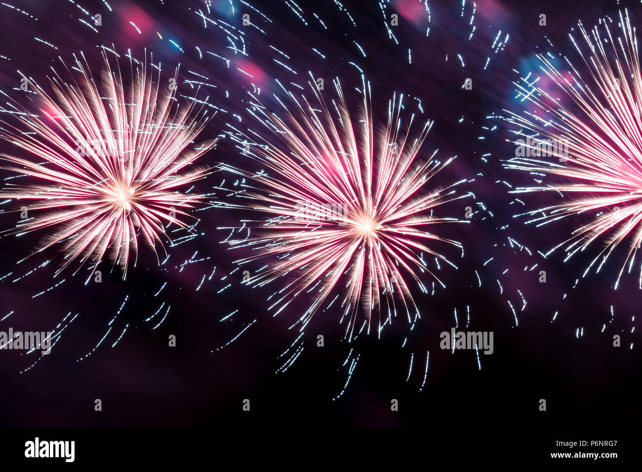 Colorful fireworks at holiday night Stock Photo - Alamy