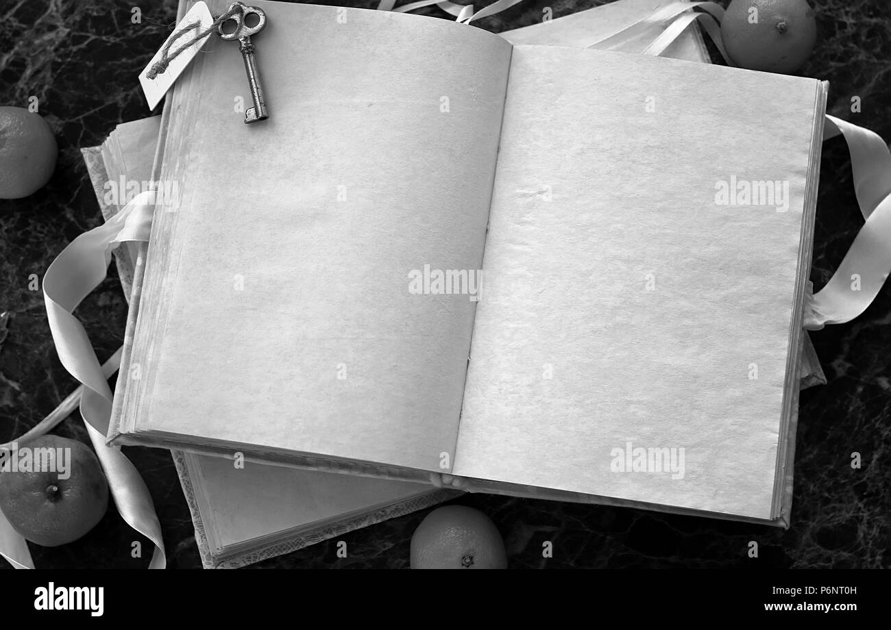 Green table with book Black and White Stock Photos & Images - Alamy