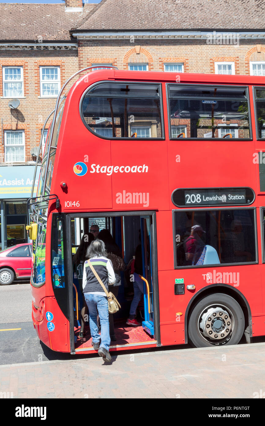 Buses dominate Orpington High Street on busy warm summer days, London ...