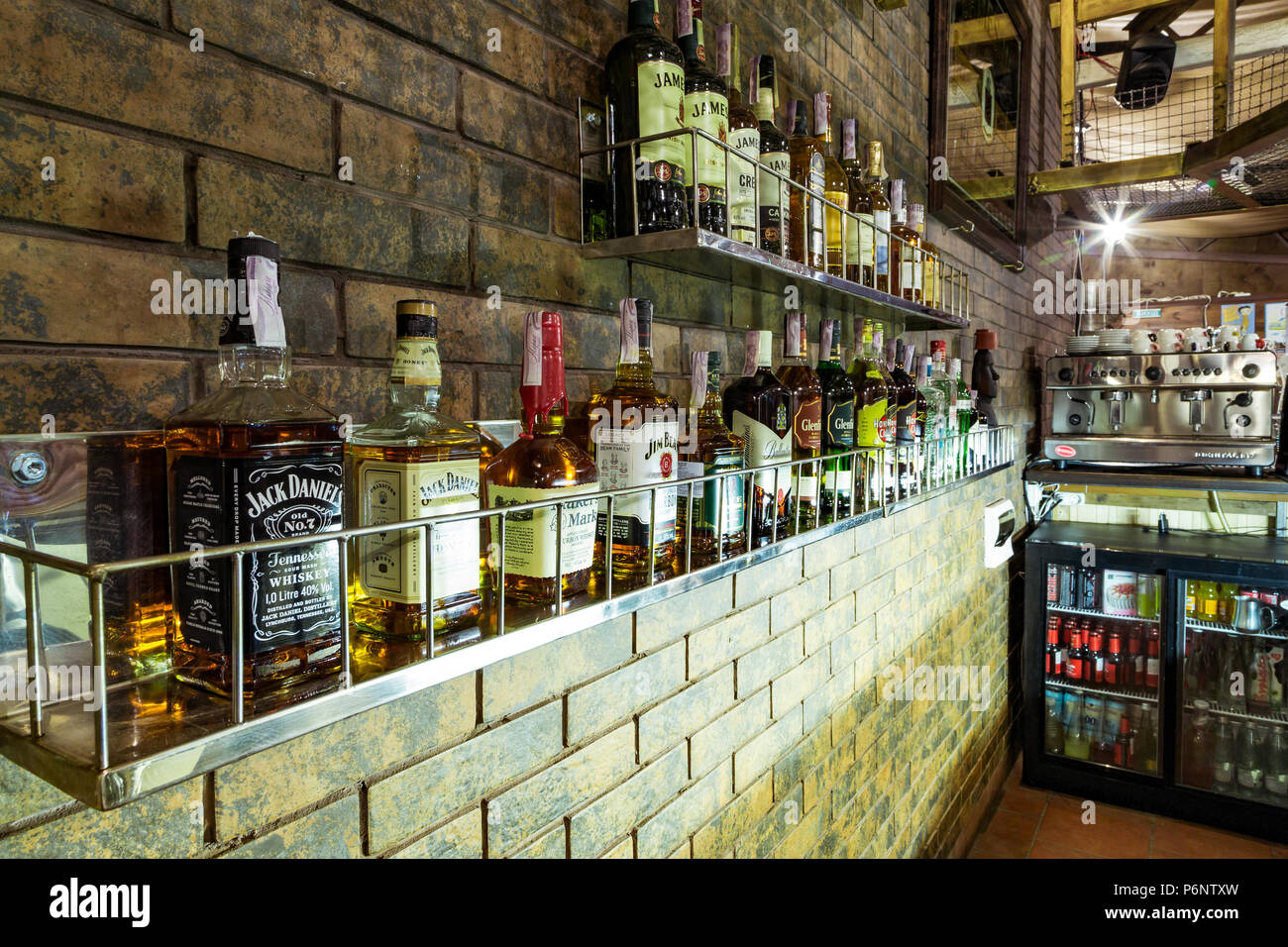 bottles of alcohol on the bar. Sale of alcohol in a restaurant or in a ...
