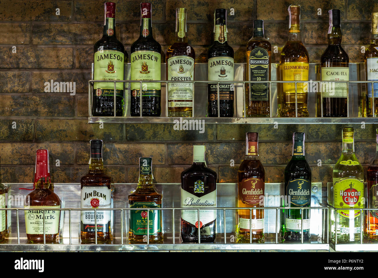 Spirit bottles on shelf in a bar hi-res stock photography and images ...