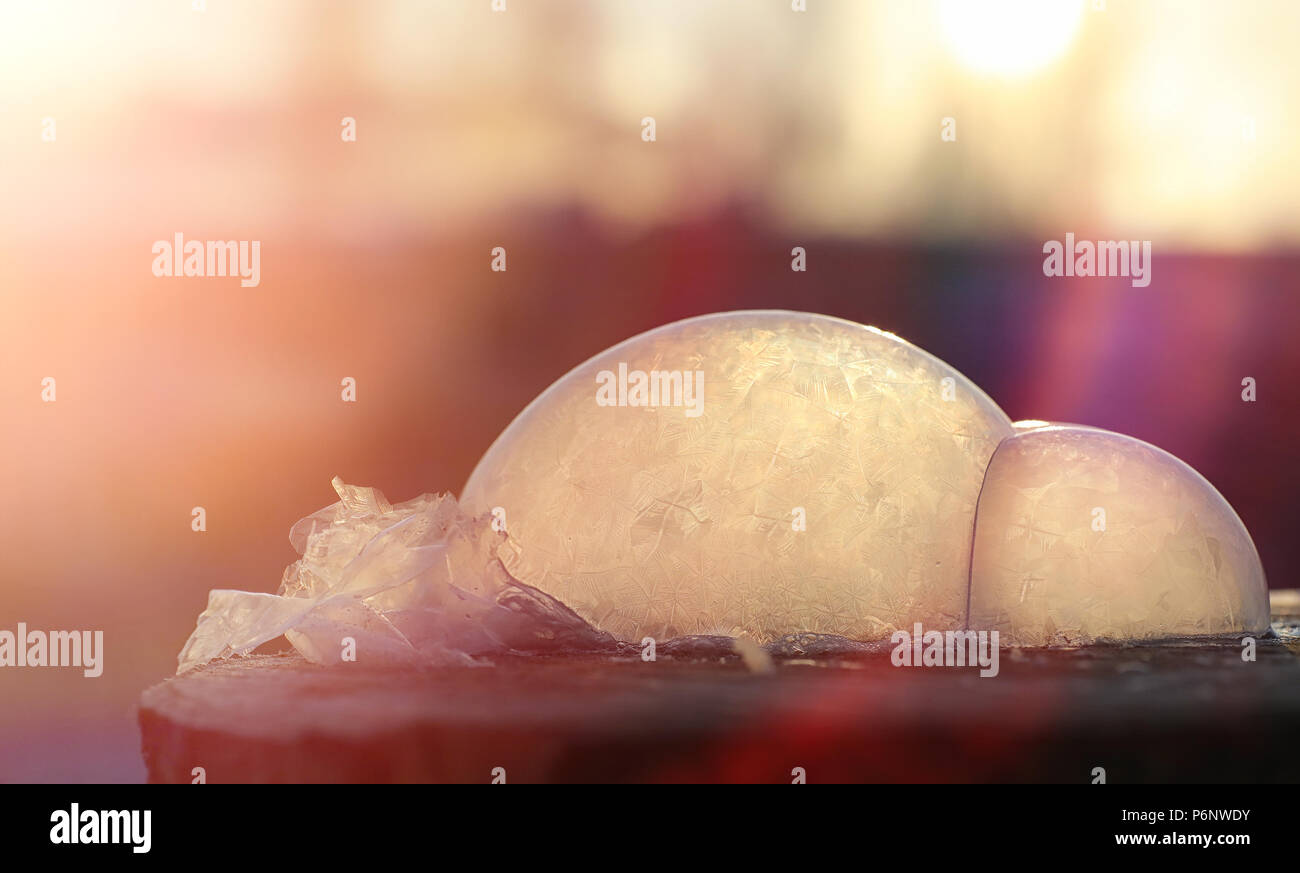 Soap bubbles freeze in the cold. Winter soapy water freezes in air ...
