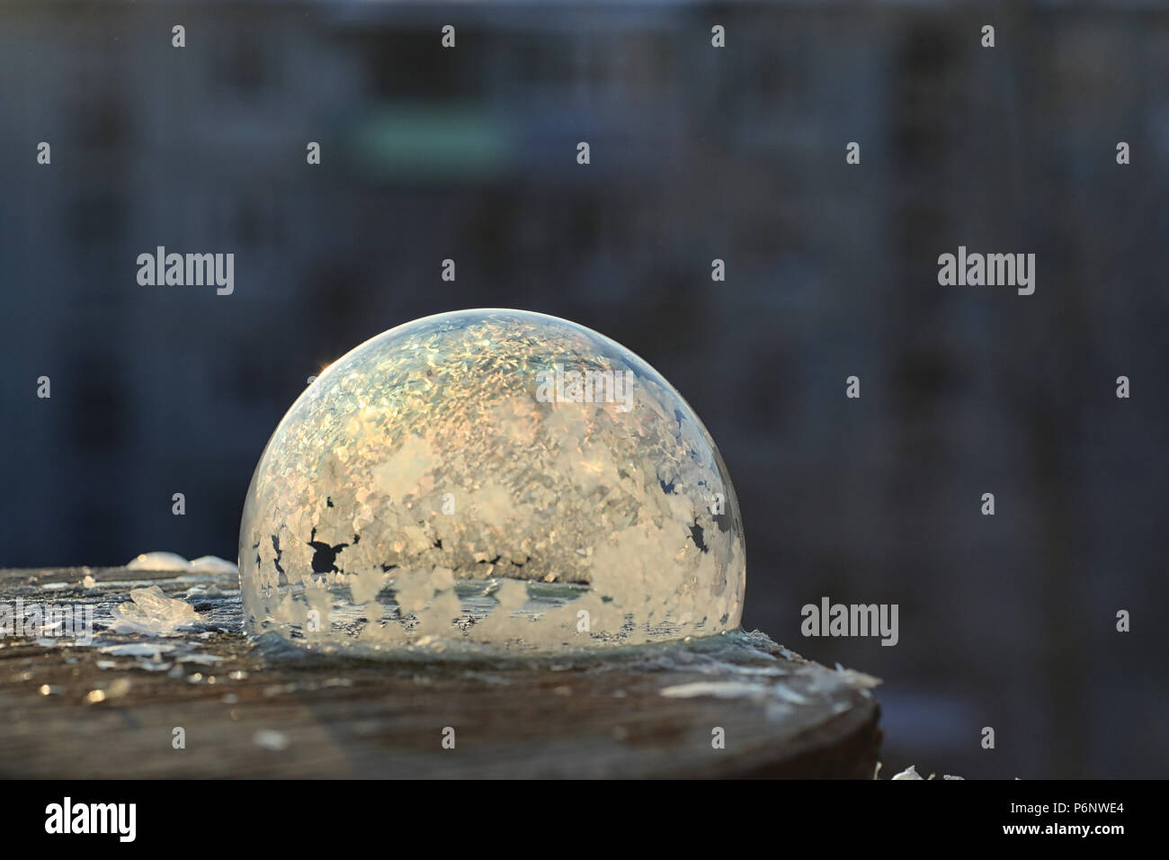 Soap bubbles freeze in the cold. Winter soapy water freezes in air ...