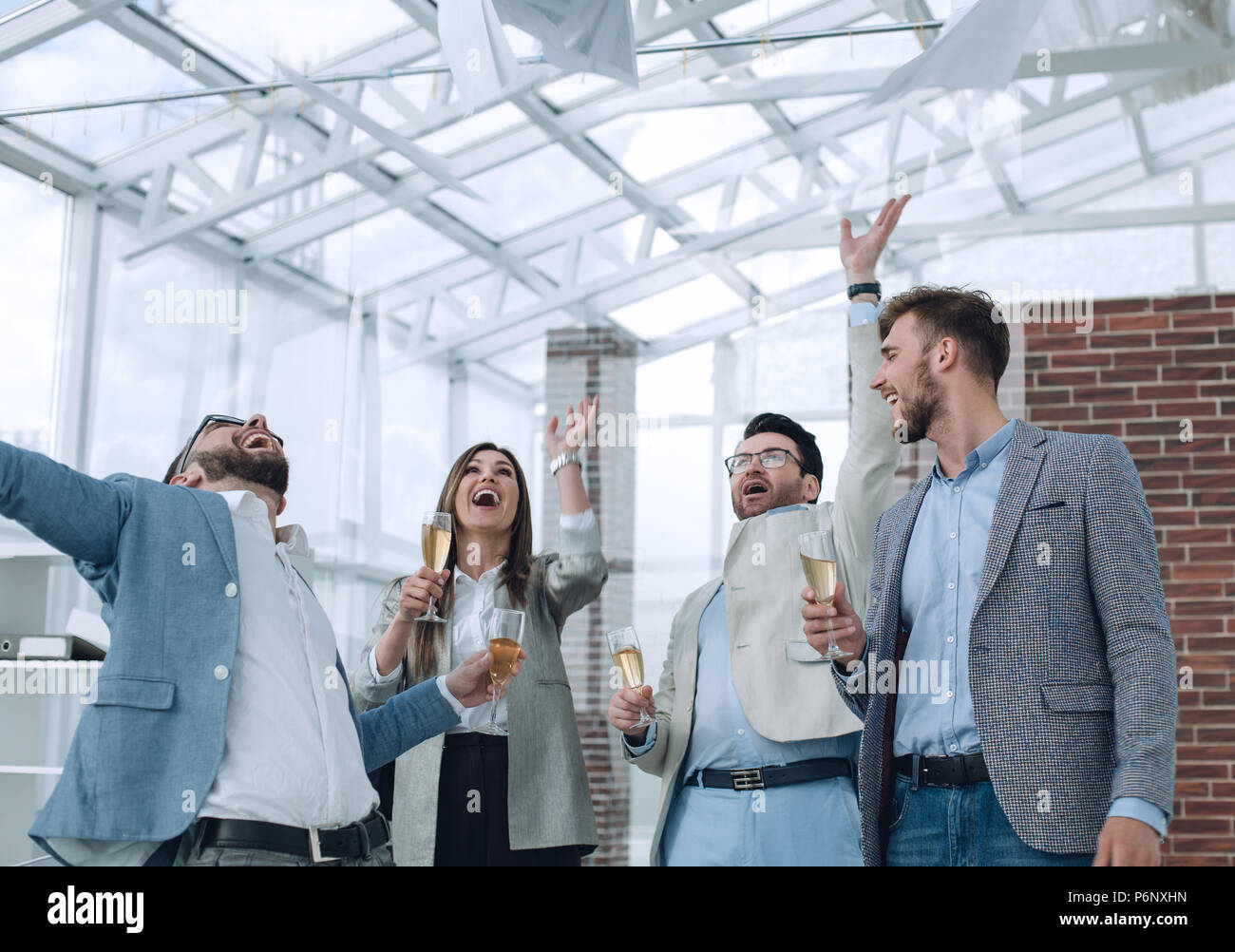 very happy business team in the office Stock Photo - Alamy