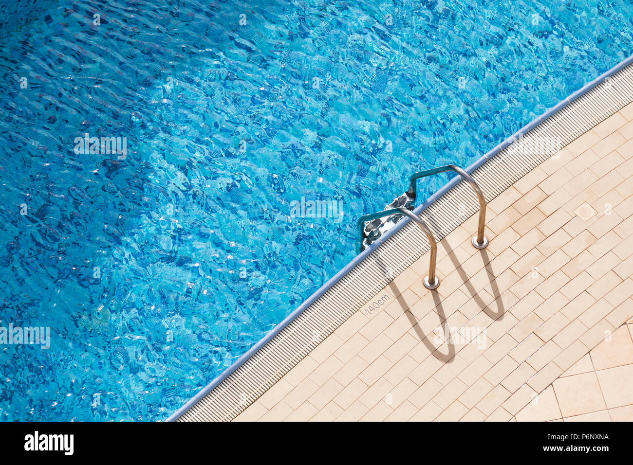 Swimming pool side background photo with depth marking and entrance ...