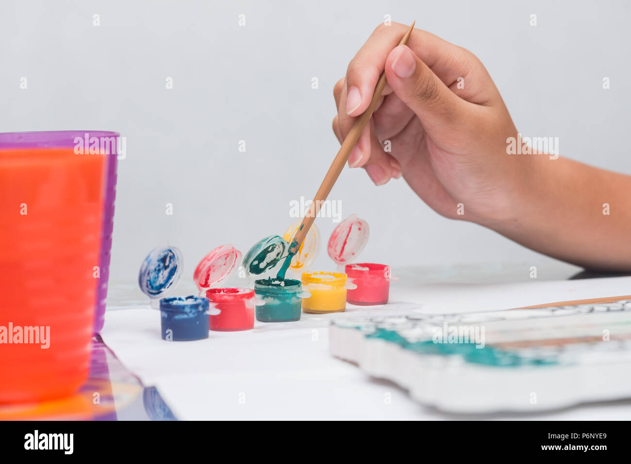 Children learn coloring and painting in classroom Stock Photo - Alamy