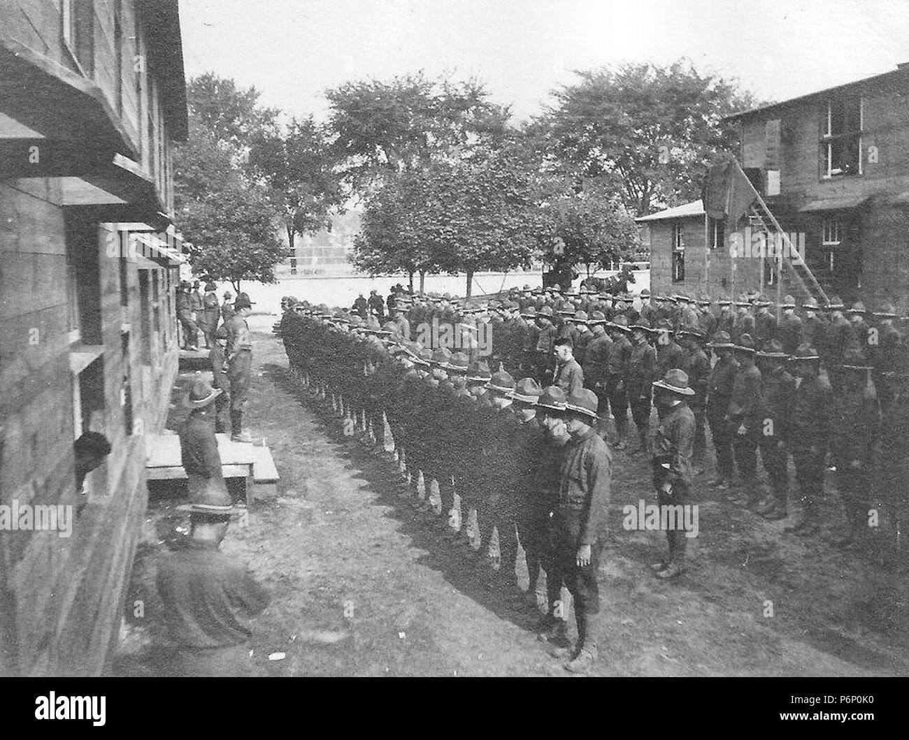 1918 - Camp Crane - Trainees Stand in Formation by Barracks Stock Photo ...