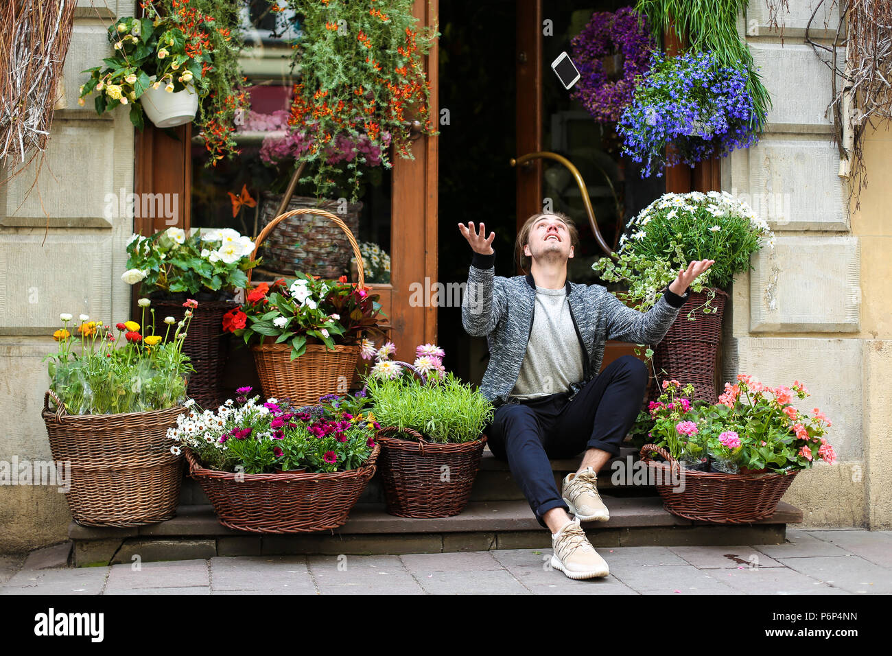 Throwing flowers in the air hi-res stock photography and images - Alamy
