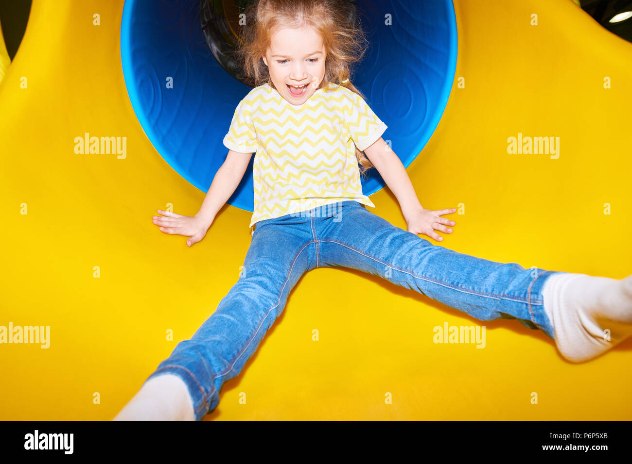 Going down the slide hi-res stock photography and images - Alamy
