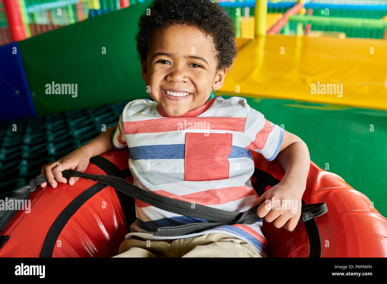 Little Boy Enjoying Slides Stock Photo - Alamy